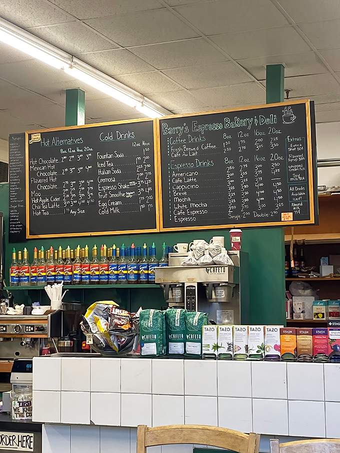 The handwritten menu board speaks volumes: real coffee, real food, real prices. No fancy names, just straightforward deliciousness.