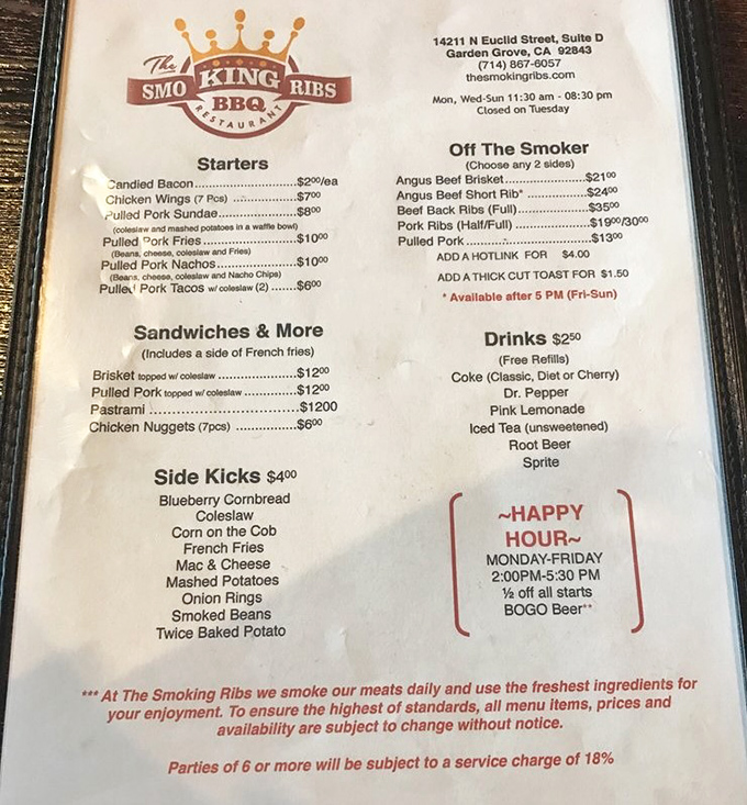 A menu that reads like BBQ poetry—candied bacon, Angus brisket, and blueberry cornbread. The hardest part isn't choosing what to order, but what to order first.
