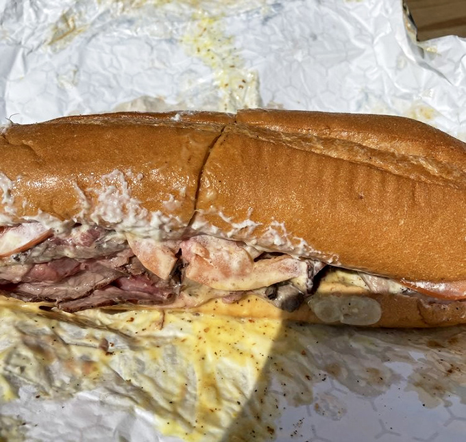 Behold the pit beef sub in all its glory – layers of smoky perfection that'll make your taste buds sing.