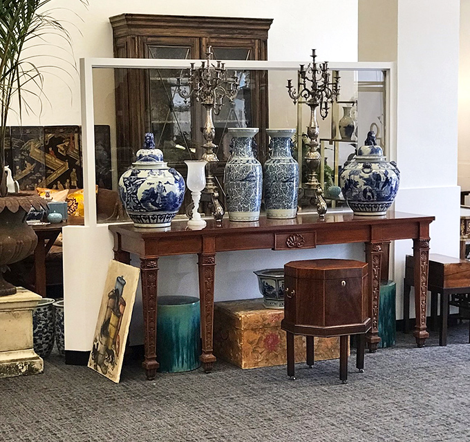 These blue and white porcelain pieces aren't just decorative—they're time travelers from centuries past, displayed with the reverence they deserve.