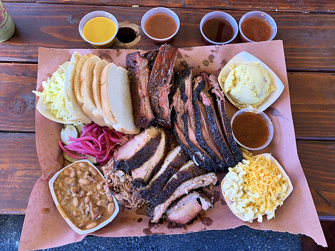 BBQ platter perfection—where the meat-to-side ratio favors carnivores and the pink smoke ring tells tales of proper technique.
