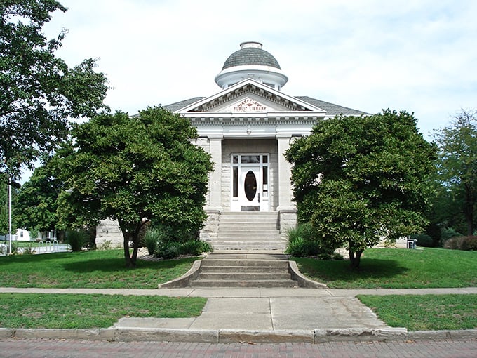 Arcola's Public Library stands as a testament to small-town grandeur with its neoclassical design and domed roof—Carnegie would be proud of how his legacy continues.