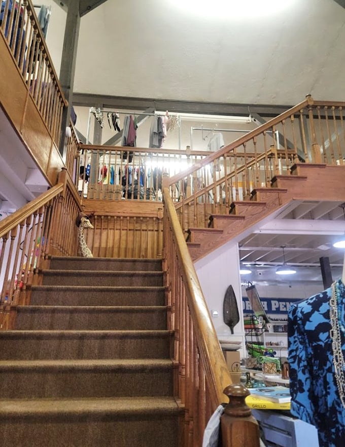 This wooden staircase isn't just steps—it's a portal to another dimension of thrifting possibilities upstairs. Mind that first step!