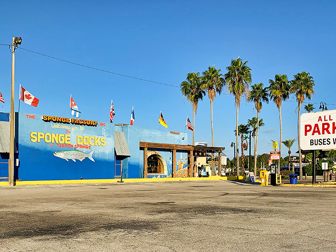 The Sponge Factory welcomes visitors with its vibrant blue facade and promise of maritime treasures—a colorful gateway to Tarpon Springs' unique industry.