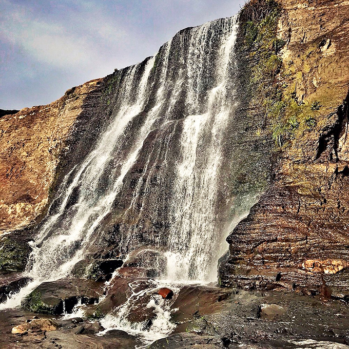 The hypnotic cascade creates a natural symphony – part gentle whisper, part thunderous applause. Mother Nature's standing ovation for those who made the trek.