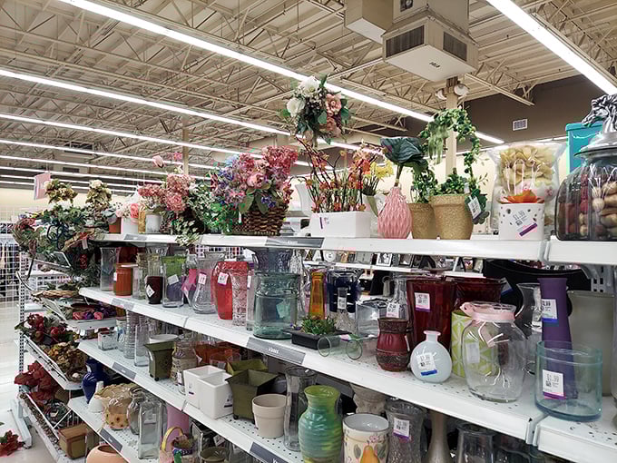 A ceramic garden blooms eternally on these shelves—vases that once held Mother's Day bouquets now ready for their encore performance.