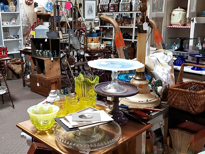 Depression glass and vintage cake stands await new homes—each piece silently whispering stories of Sunday dinners and celebrations long past.