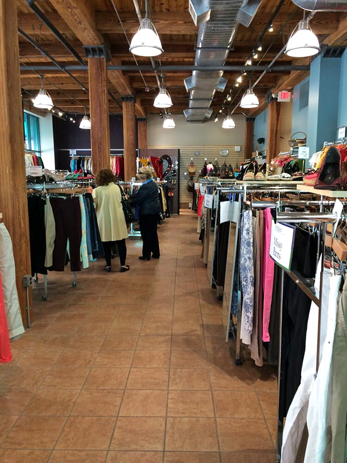 Organized racks create a shopping experience where finding treasures feels like a delightful scavenger hunt rather than an archaeological dig.