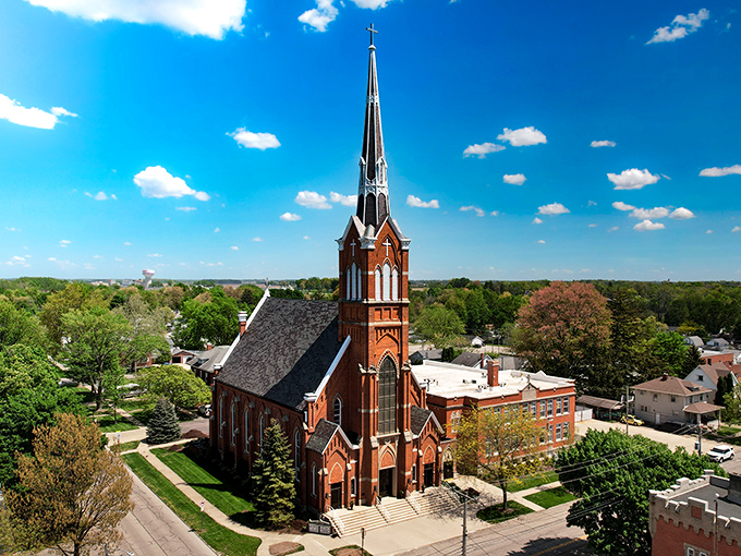 This stunning brick church reaches skyward with its impressive spire, offering both spiritual comfort and an architectural feast for the eyes.