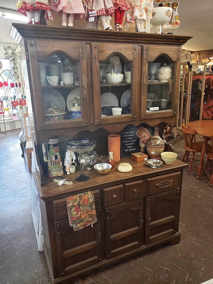 Grandma's china cabinet never looked this good! This wooden hutch holds memories of Sunday dinners past while awaiting its next chapter in someone's home.