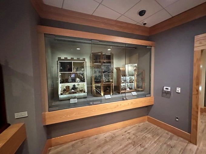 Behind glass walls, tiny masterpieces await discovery by visitors who appreciate extraordinary craftsmanship and patience.