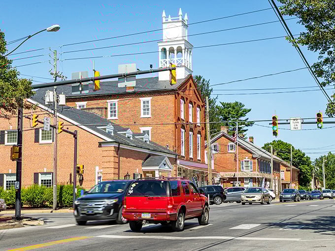 Downtown Strasburg doesn't need neon to shine—its brick buildings and white church spire have been turning heads since George Washington was just another guy with wooden teeth.