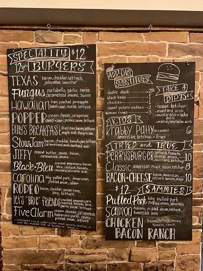 The chalkboard menu reads like a burger lover's fantasy novel – each creation more intriguing than the last. The "Jiffy" with peanut butter sauce? Genius madness.