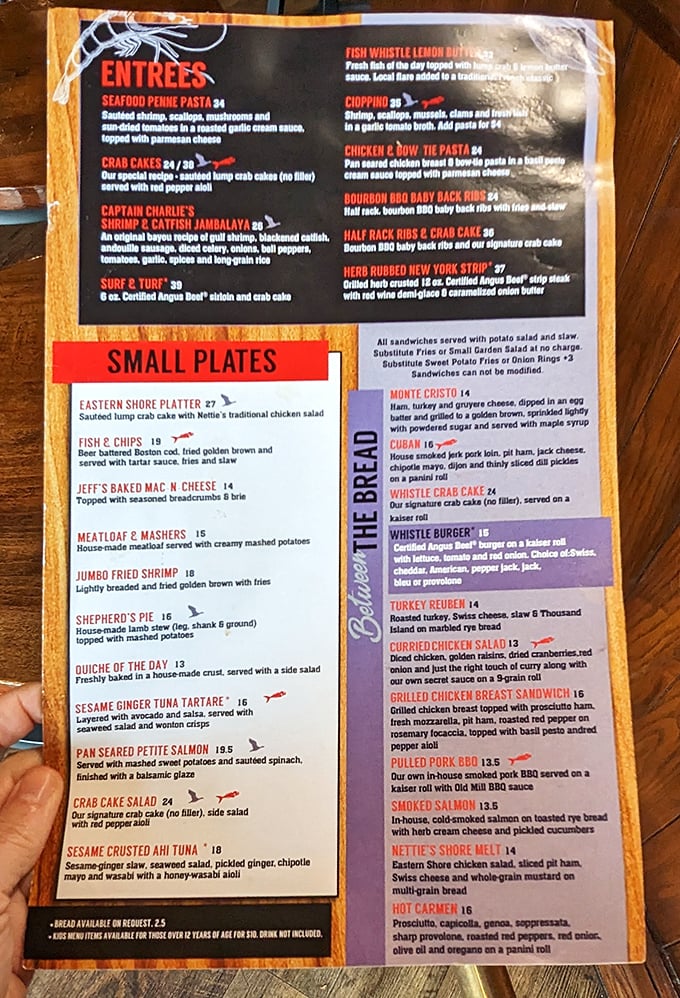 This menu reads like a love letter to the Chesapeake Bay. The "no filler" note beside the crab cakes isn't marketing—it's a solemn promise.