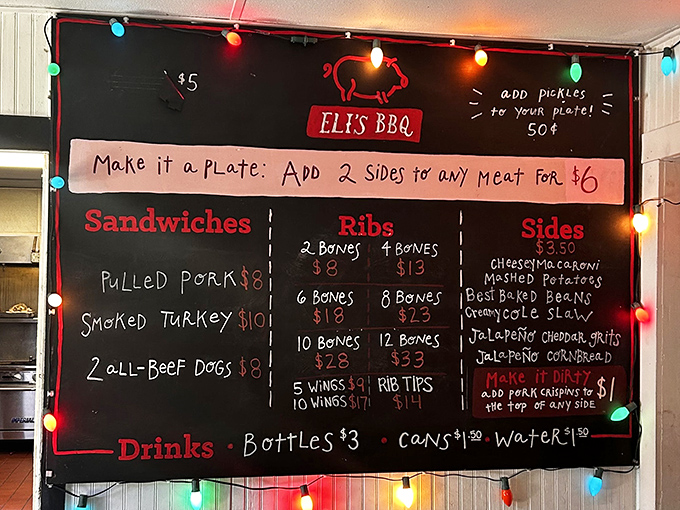 A menu that doesn't need fancy fonts or elaborate descriptions—just the honest promise of barbecue excellence illuminated by festive string lights.