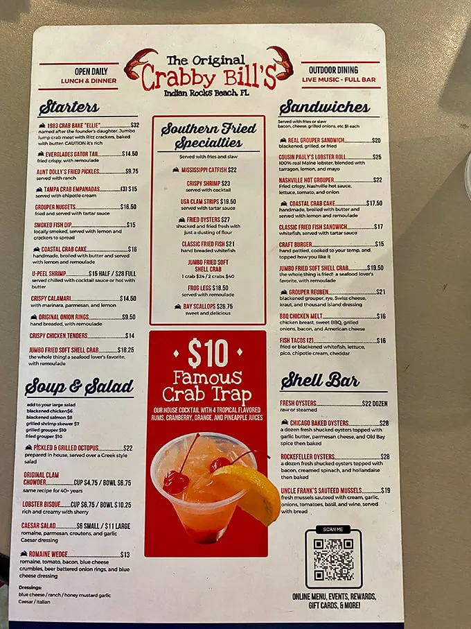 The menu reads like a love letter to the Gulf of Mexico—grouper sandwiches, stone crab claws, and that famous "Crab Trap" cocktail calling your name.