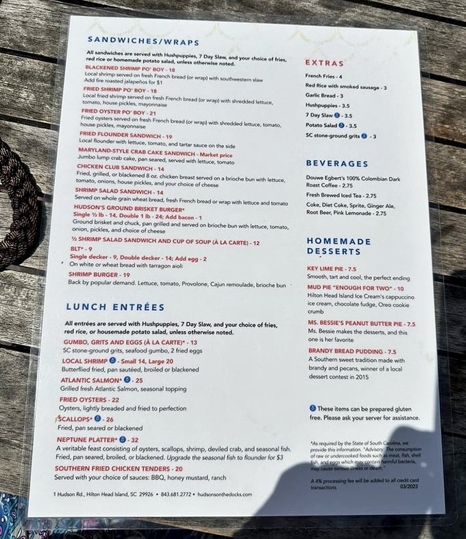 This menu isn't just a list of options—it's a treasure map to Lowcountry culinary bliss. X marks the shrimp and grits!