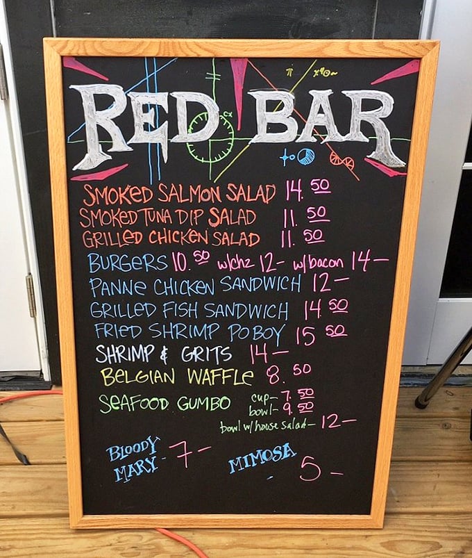 The chalkboard menu – simple, straightforward, and promising delights that would make Neptune himself swim ashore. Those seafood options are calling my name!