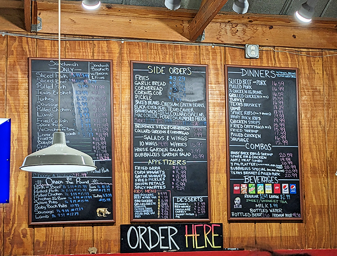 The chalkboard menu – barbecue's version of sacred text – offers a straightforward promise: meat, sides, and happiness, with no pretentious frills required.