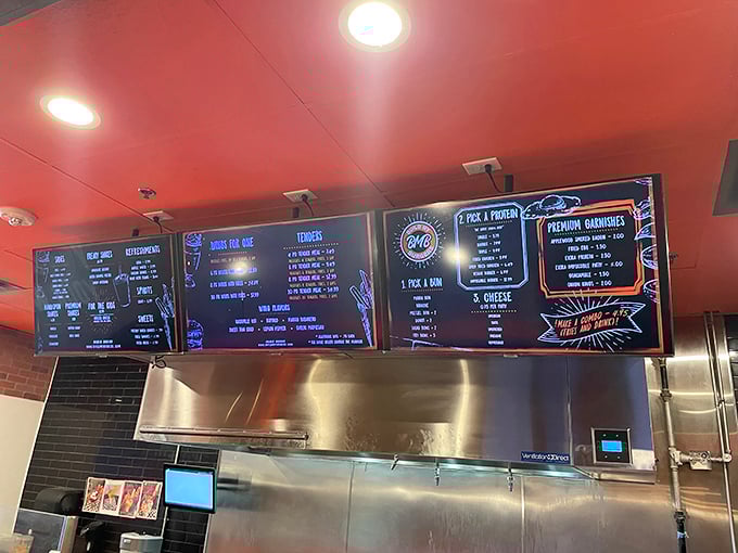 The menu board isn't just a list; it's a roadmap to delicious possibilities. Choose your own burger adventure!