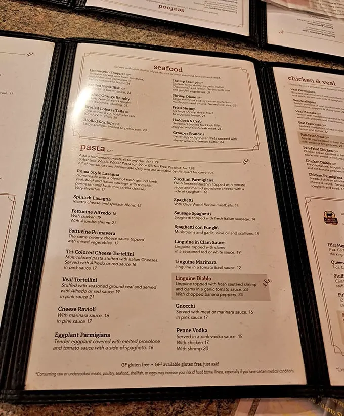 The menu reads like a love letter to Italian cuisine with seafood playing a starring role. That crab cake isn't just listed—it's headlining.