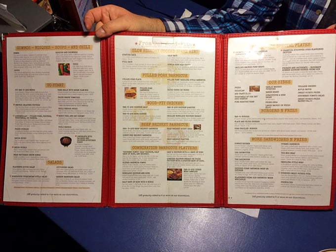 The menu reads like a love letter to smoked meats, with each description promising a different path to culinary bliss.