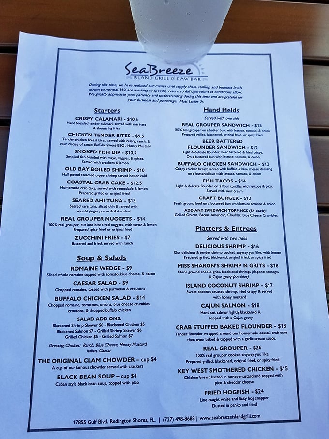 A menu that reads like a love letter to Gulf seafood, with the Island Coconut Shrimp practically winking at you from the entrée section.
