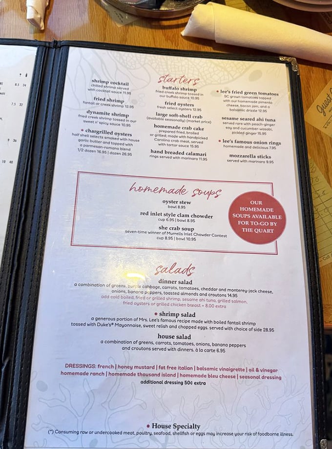 A menu that reads like coastal poetry – she-crab soup, dynamite shrimp, and homemade crab cakes that have launched a thousand return trips.