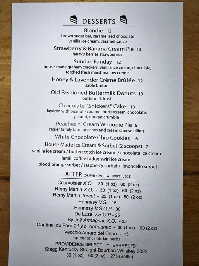 The dessert menu reads like a love letter to comfort—that "Snickers" cake isn't just dessert, it's therapy with a fork.