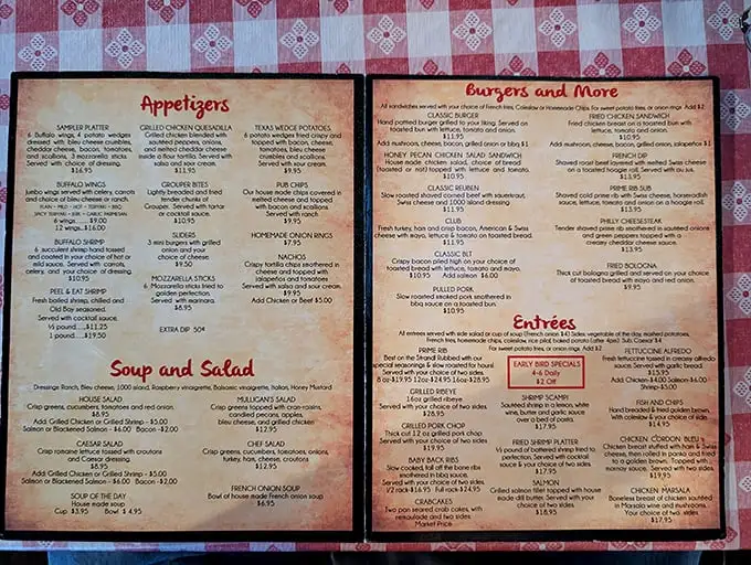 Red checkered menus never lie – they promise comfort food delivered with zero pretense or disappointment.