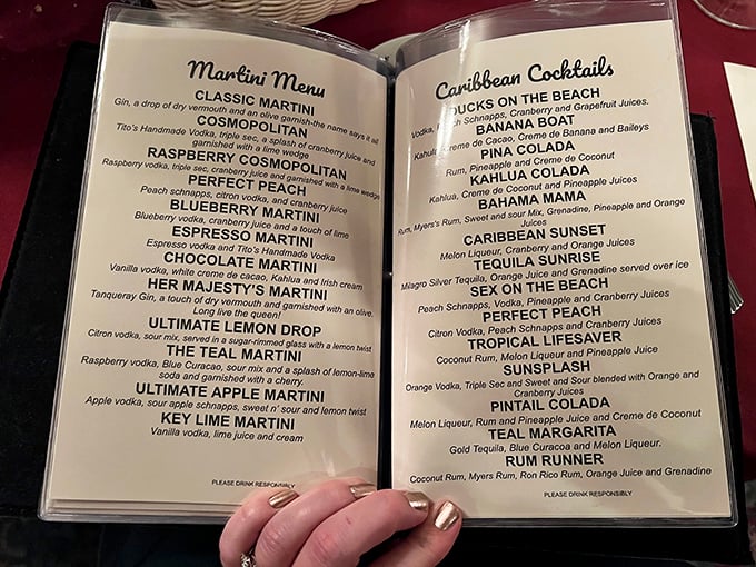 A cocktail menu that reads like a passport to relaxation. The "Sex on the Beach" might make grandma blush, but she'll order it anyway.