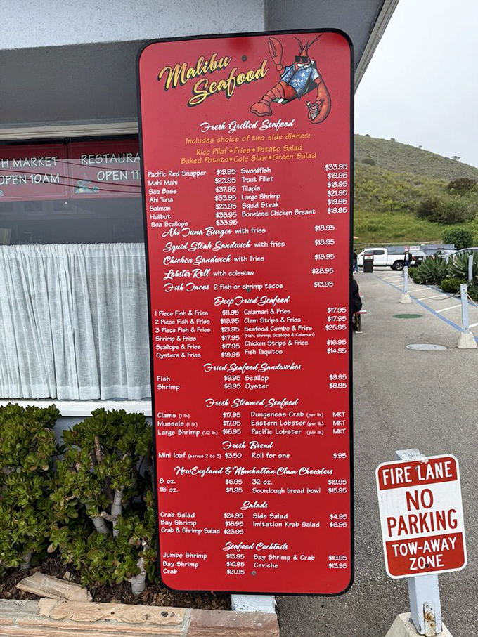 The menu board tells a delicious story in red and gold. Each item promises ocean-fresh delights that would make Neptune himself place an order.