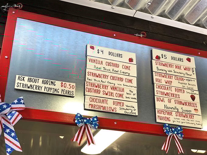 Hand-written menu boards showcase strawberry possibilities you never knew existed – it's like Willy Wonka discovered fruit instead of chocolate.