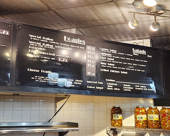 The menu board reads like a love letter to sandwich perfection. Decisions, decisions – all of them delicious.