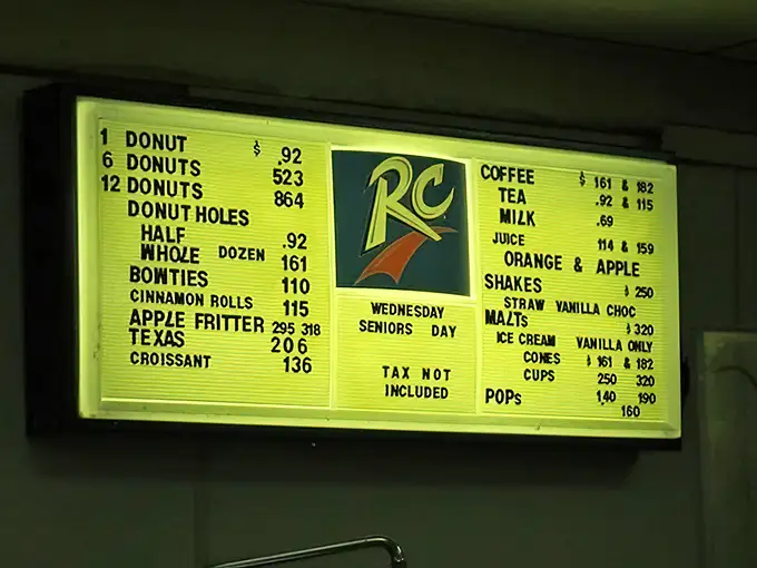 Menu prices that feel like a time machine to simpler days. The RC logo brings back memories of when soda choices were delightfully uncomplicated.