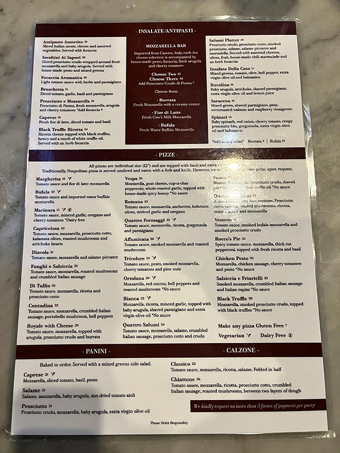 The menu reads like a love letter to Naples. Each pizza promises a different kind of happiness, all delivered in under 90 seconds.