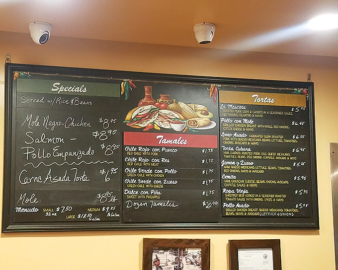 That menu board reads like a love letter to Mexican comfort food, with tamales taking center stage.
