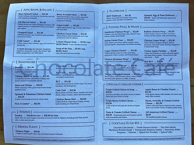 A menu that reads like a love letter to comfort food. Each category promises satisfaction, from grilled cheese symphonies to salads that aren't just obligation eating.