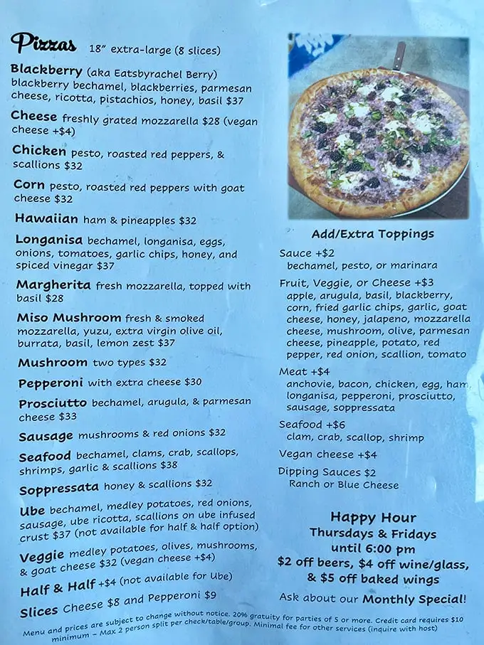 This menu reads like a love letter to pizza innovation. The Blackberry pizza with pistachios and honey? That's not rebellion—that's delicious revolution.
