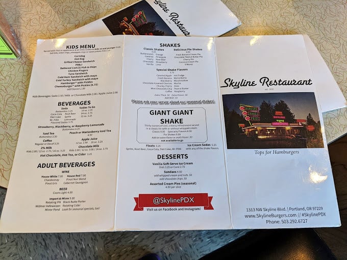 The menu reads like a love letter to American classics—Giant Giant Shakes aren't a typo, they're a promise your sweet tooth can take to the bank.