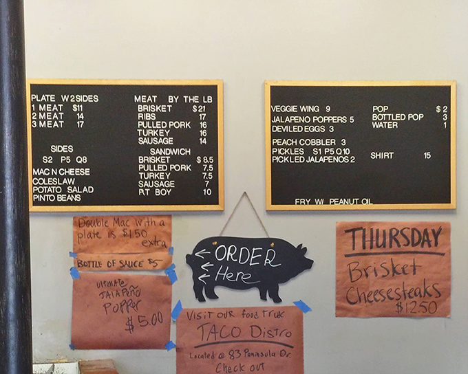 The menu board tells you everything you need to know: meat, sides, and absolutely no pretension. Decision paralysis has never been so delicious.