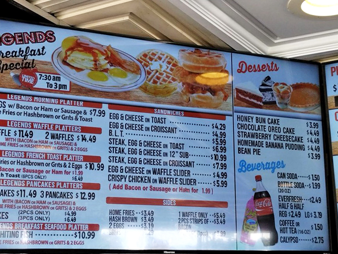 This menu board is like a roadmap to happiness—breakfast platters, chicken and waffles, and desserts that make dieting seem like a terrible life choice.