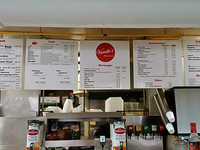The menu board tells a story of culinary consistency—where generations have ordered the same beloved dishes without needing a dictionary to decipher them.
