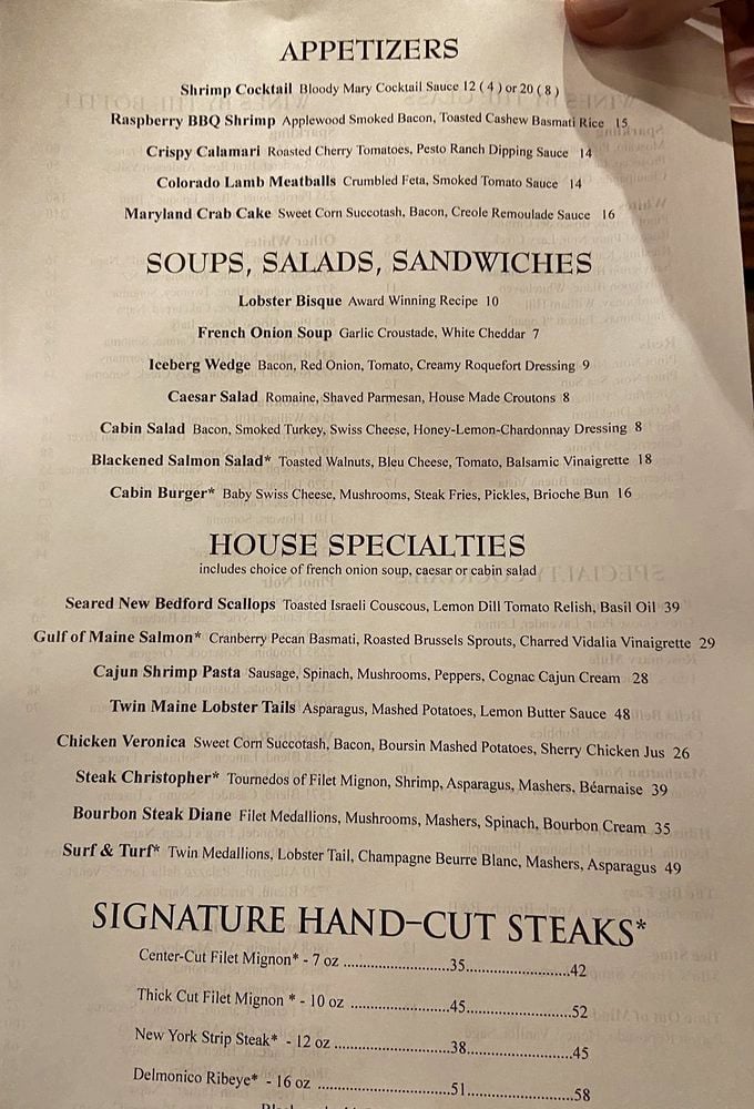 The menu reads like a love letter to classic American cuisine—notice how "Award Winning Recipe" accompanies the lobster bisque? That's not just marketing talk.