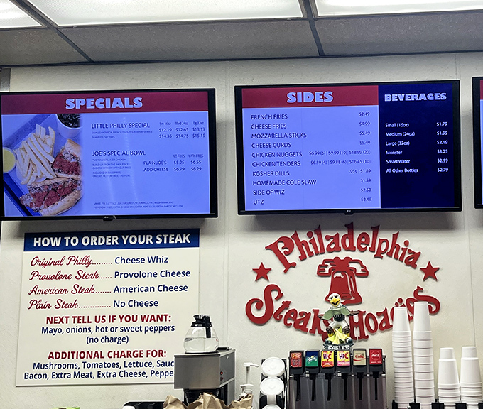 The menu board – a roadmap to sandwich nirvana. "How to order your steak" isn't just instructions, it's a cultural education.