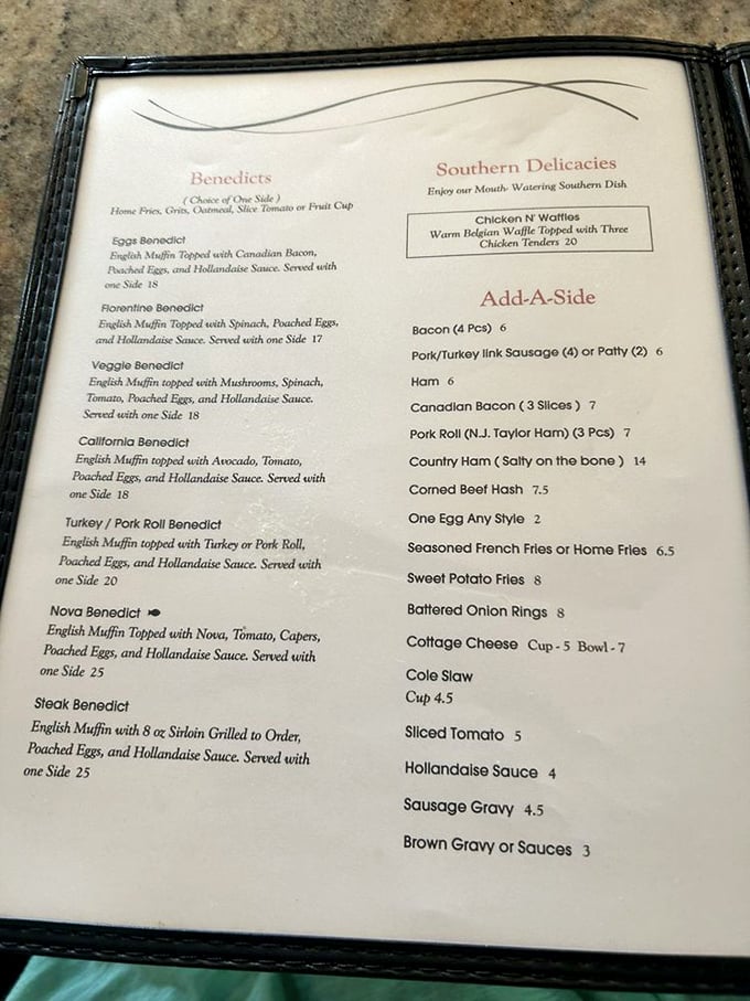 A menu that reads like breakfast poetry – benedicts, southern delicacies, and sides that deserve their own fan club. Choose wisely, my friends.