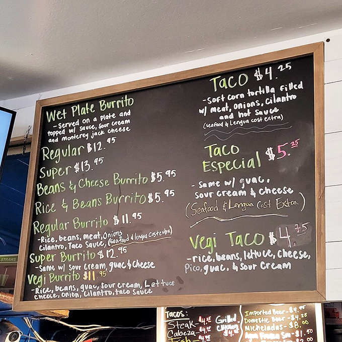 The handwritten menu board tells no lies – just honest prices for extraordinary Mexican comfort food. 