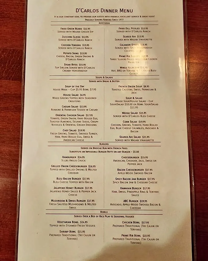 A menu that reads like a love letter to comfort food classics, offering everything from prime rib to burgers that would make your cardiologist wince and your taste buds rejoice.