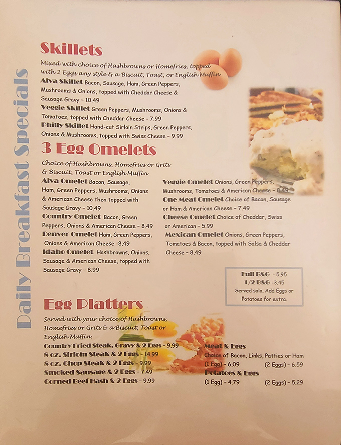 The menu reads like breakfast poetry – skillets, omelets, and platters that promise to turn your morning hunger into pure satisfaction.