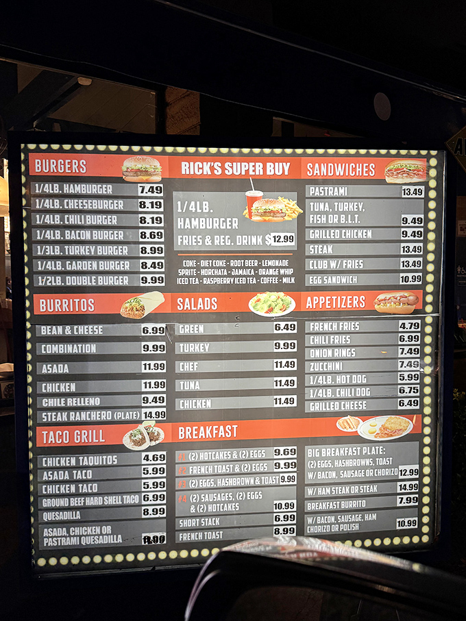 The illuminated menu board tells the whole delicious story—from burgers to burritos, with breakfast served all day. Decision paralysis never tasted so good.